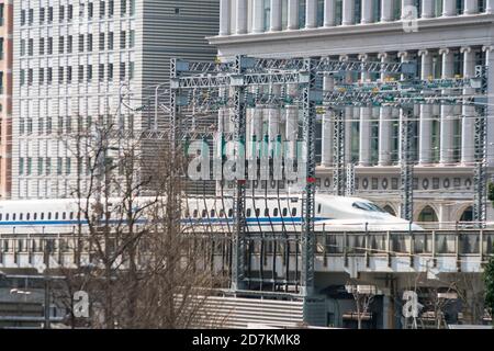 JR Shinkansen runs on elevated railway track at Shinbashi Tokyo Japan ...