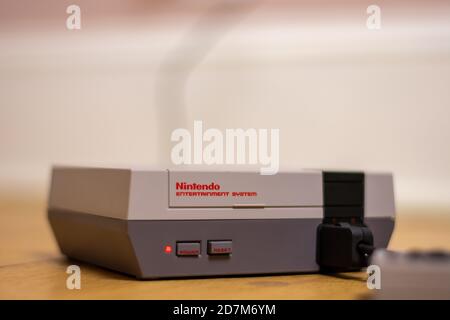 A Nintendo Entertainment System Classic Edition on Top of an Original ...