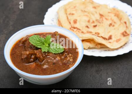 Kerala beef with parotta porotta roti. beef fry beef curry kerala style ...