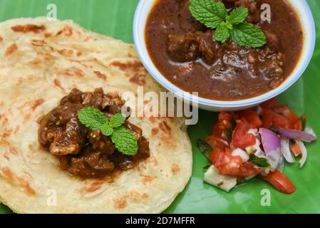 Kerala beef with parotta porotta roti. beef fry beef curry kerala style ...