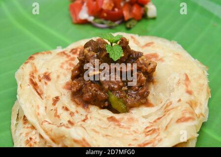 Kerala beef with parotta porotta roti. beef fry beef curry kerala style ...