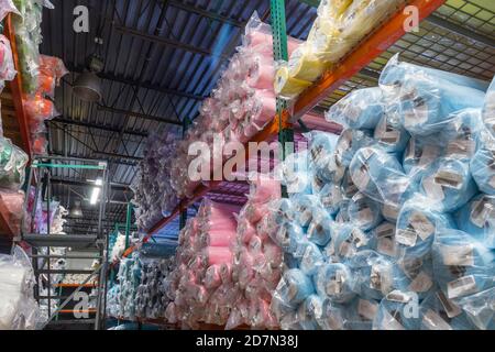 Interior of a industrial warehouse with fabric rolls Stock Photo - Alamy