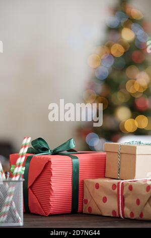 New Year's gifts are packed in craft paper and tied with red jgut and ...