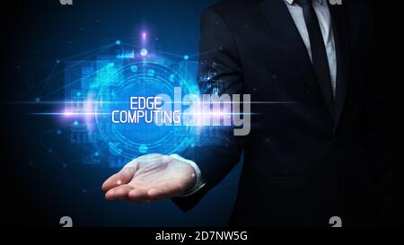 Man hand holding EDGE COMPUTING inscription, technology concept Stock ...
