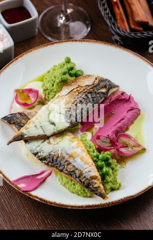 grilled fish fillet with vegetable mousse Stock Photo - Alamy