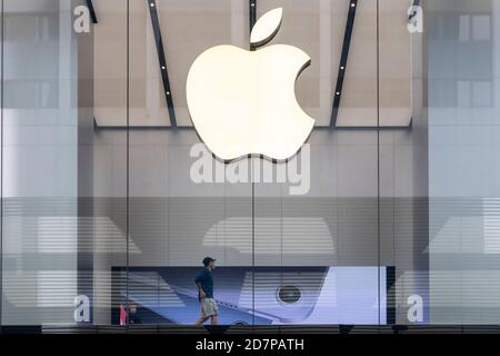 The multinational American technology brand Apple store and logo seen ...