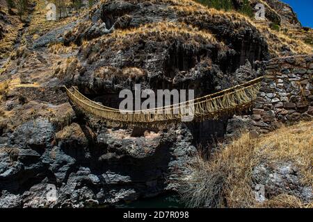 Qu'eswachaka suspension bridge, rope bridge made of woven Peruvian ...