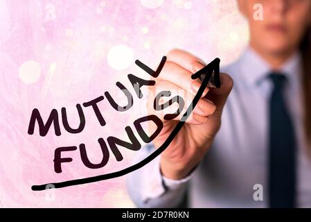 Writing note showing Mutual Funds. Business photo showcasing An ...