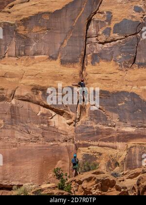 Climbers ascend the lower flanks of Independence monument, Monument ...