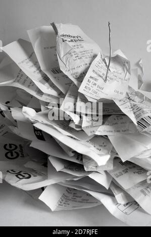 Stack of receipts on bill spike Stock Photo - Alamy