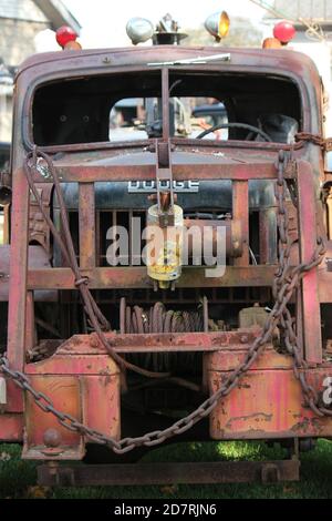 Halloween decoration of a creepy mechanic skeleton driving a rusted old ...