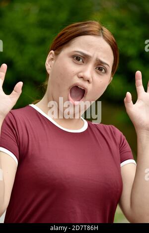 Asian Adult And Confusion Wearing Tshirt Stock Photo - Alamy