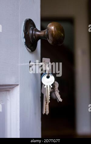 Door knob locks with keys Stock Photo - Alamy