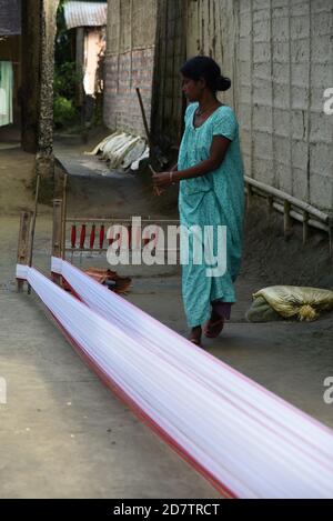 Guwahati, Assam, India. 25th Oct, 2020. An Assamese aged woman ...