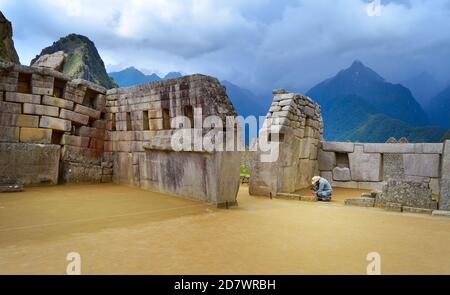 Machu Picchu, Peru, Indigenous man at the archaeological ruins, Inca ...