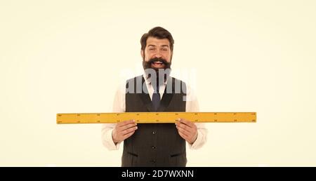Maths teacher taking measurement. this is too big. happy man measure ...