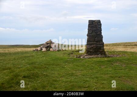Cairn and trig column on Lank Rigg summit, Lake District, Cumbria. The ...