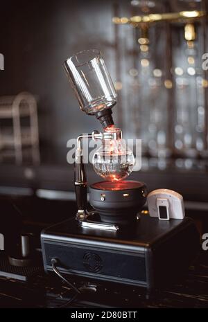 coffee In a glass bottle,Coffee drip,Hand holding a kettle Drip Coffee ...
