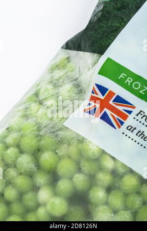 Tesco own label frozen peas in original packaging with part of food ...