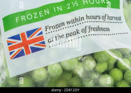 Tesco own label frozen peas in original packaging with part of food ...