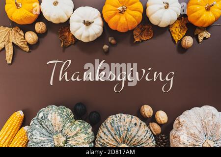 Happy Thanksgiving Day with pumpkin and nut on wooden table Stock Photo ...
