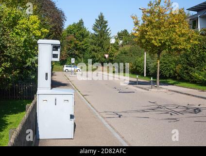 Speed camera on the narrow street of small swiss city. The 30 km/h is ...
