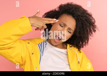 The dark-haired girl in a pink dress in a straw hat smiles slyly ...