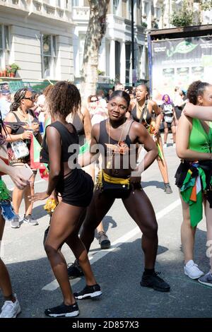 Revellers dance in colorful costumes at Carneval in Greece, 17 March ...