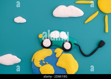 Electric car driving around planet Earth. Concept Image. Scene is made ...