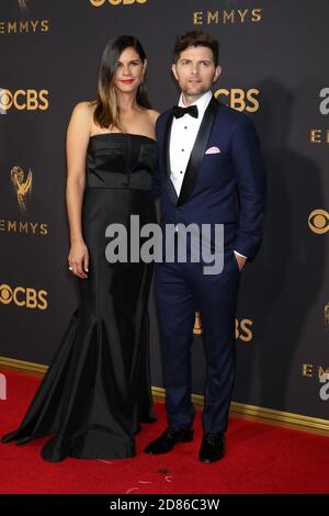 Naomi Scott (L) and actor Adam Scott at the 69th Annual Emmy Awards held at the Microsoft ...
