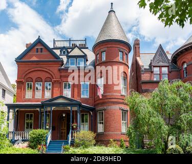 Round window tree and house Stock Photo - Alamy