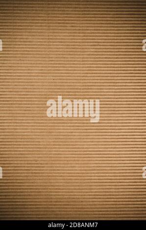Brown corrugated cardboard background - vertical Stock Photo - Alamy