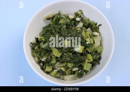 Rayo ko saag fry, stir fry mustard greens, Sikkim or nepali curry Stock ...