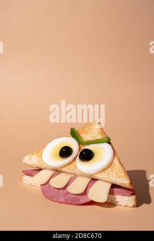 Boy eating monster sandwich Stock Photo - Alamy
