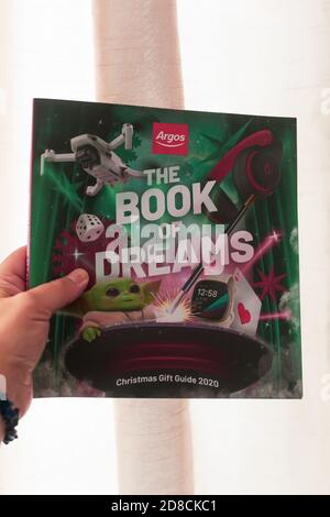 Hand holding a 2020 Argos Catalogue (Book of Dreams Christmas Gift ...