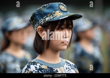 Over 7000 freshmen of Central China Normal University wear camouflage T ...
