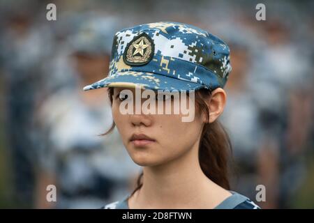 Over 7000 freshmen of Central China Normal University wear camouflage T ...