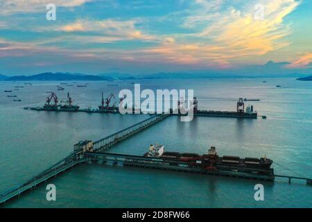Aerial view of ships uploading and unloading containers at Zhoushan ...