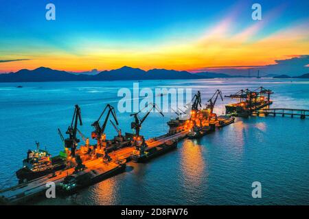 Aerial view of ships uploading and unloading containers at Zhoushan ...