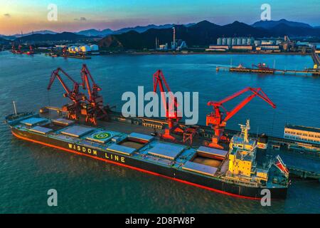 Aerial view of ships uploading and unloading containers at Zhoushan ...