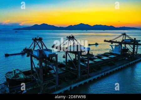 Aerial view of ships uploading and unloading containers at Zhoushan ...