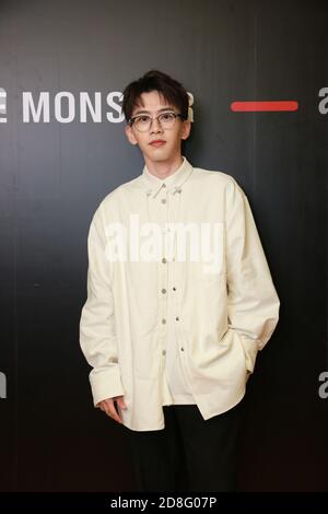 Chinese singer and Internet celebrity Fei Qiming smiles to customers ...