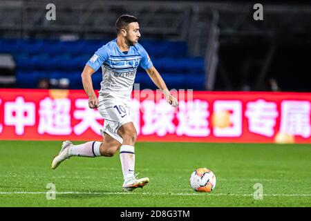 Israeli-Arab football player Dia Saba of Guangzhou R&F F.C. celebrates ...