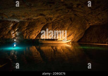 Boat in Lac Souterrain de Saint-Léonard, Valais Stock Photo - Alamy