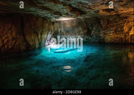 Boat in Lac Souterrain de Saint-Léonard, Valais Stock Photo - Alamy