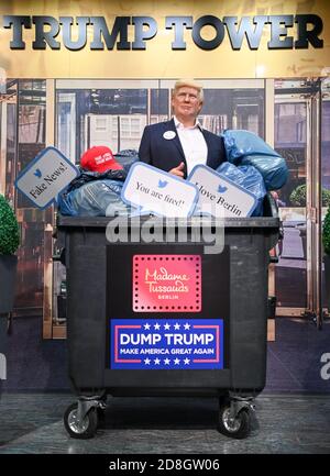 President Donald Trump stands in the presidential box as he tours the ...