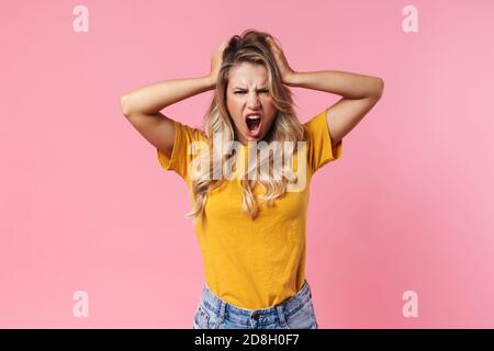 Image of furious blonde girl screaming with raising up hands isolated ...