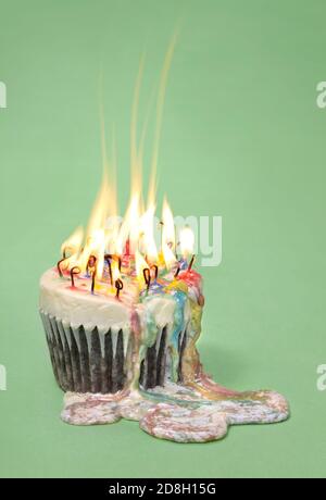 chocolate birthday cupcake with candle over dark background Stock Photo ...