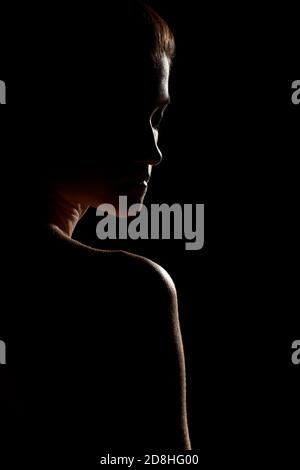 sad female profile silhouette on stars background with copy space ...
