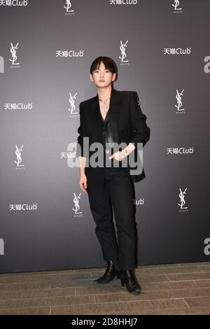 Chinese rapper and singer Zhou Zhennan of idol boy band R1SE attends a ...